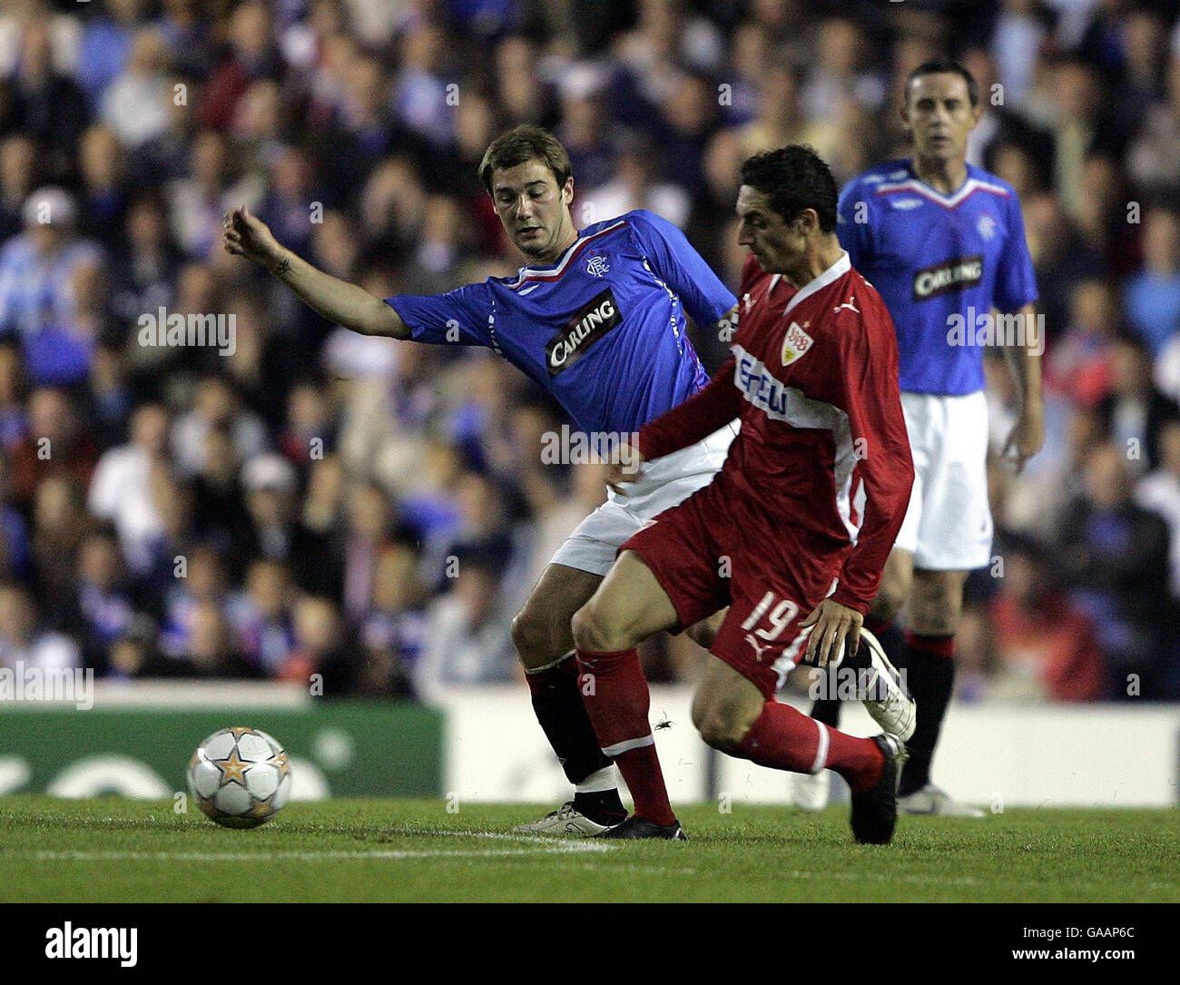 Rangers' Kevin Thomson (left) challenges Stuttgart's Roberto Hilbert ...