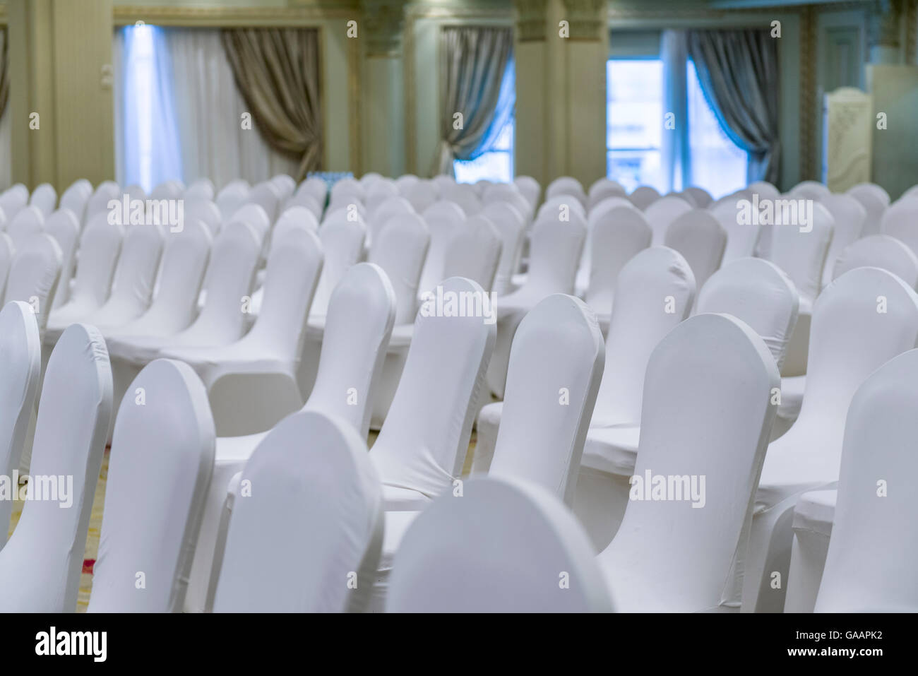 Wedding Hall Full of White Wedding Chairs Stock Photo - Alamy