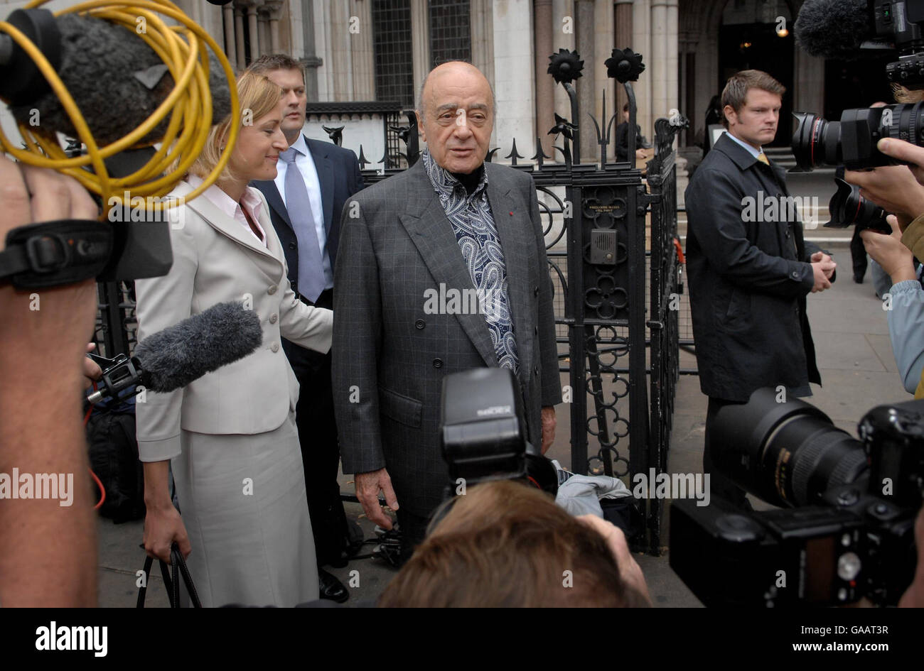 Mohammed Al Fayed arrives at the High Court in London today for the ...