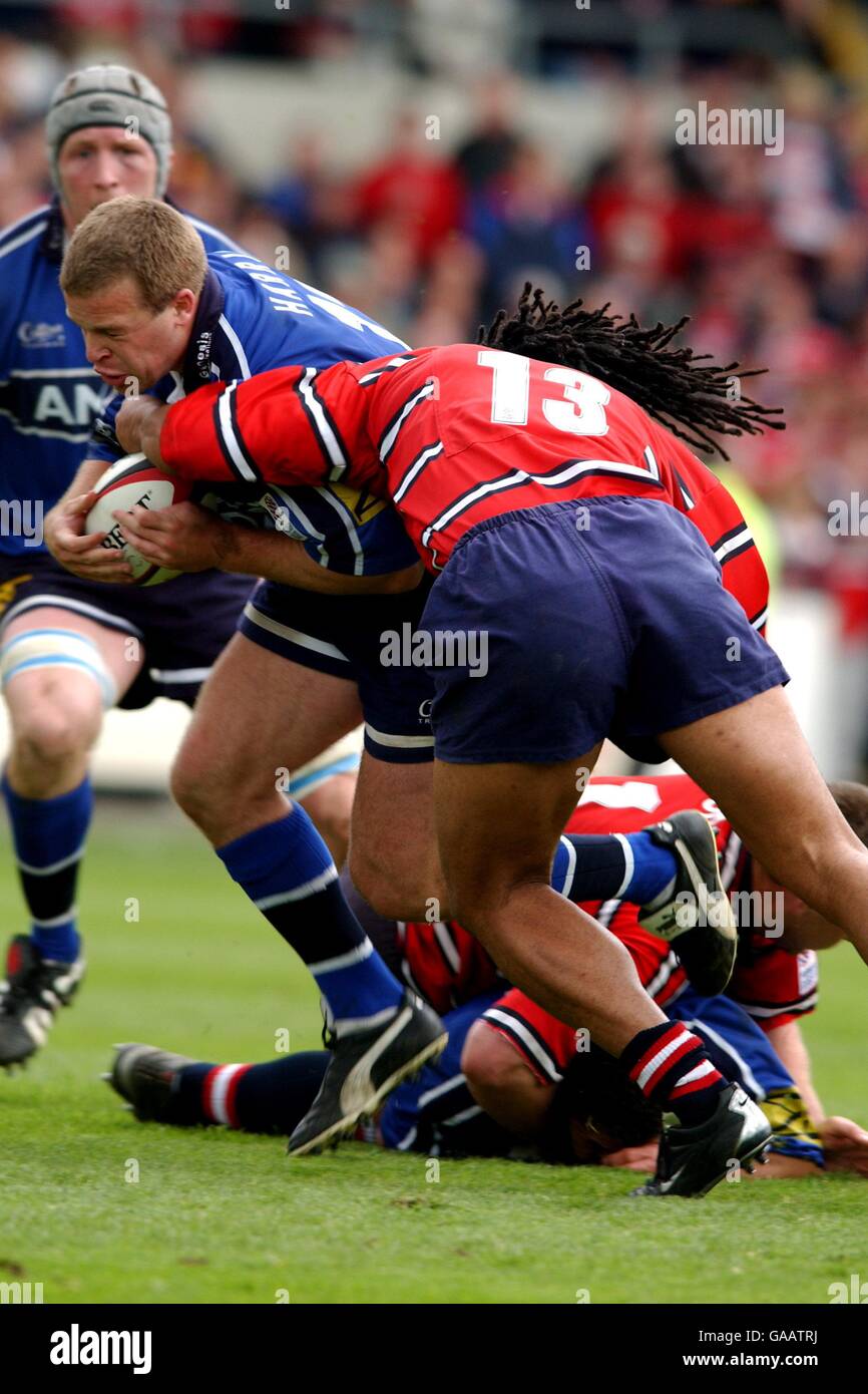 Gloucester Steve Hanley (l)is tackled by Sale Sharks' Terry Fanolua ...
