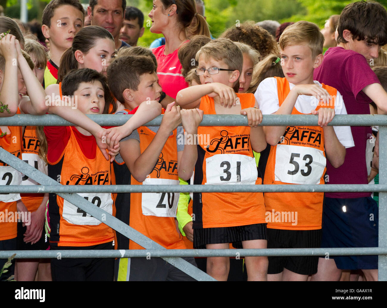 Boy waiting at gate hi-res stock photography and images - Alamy