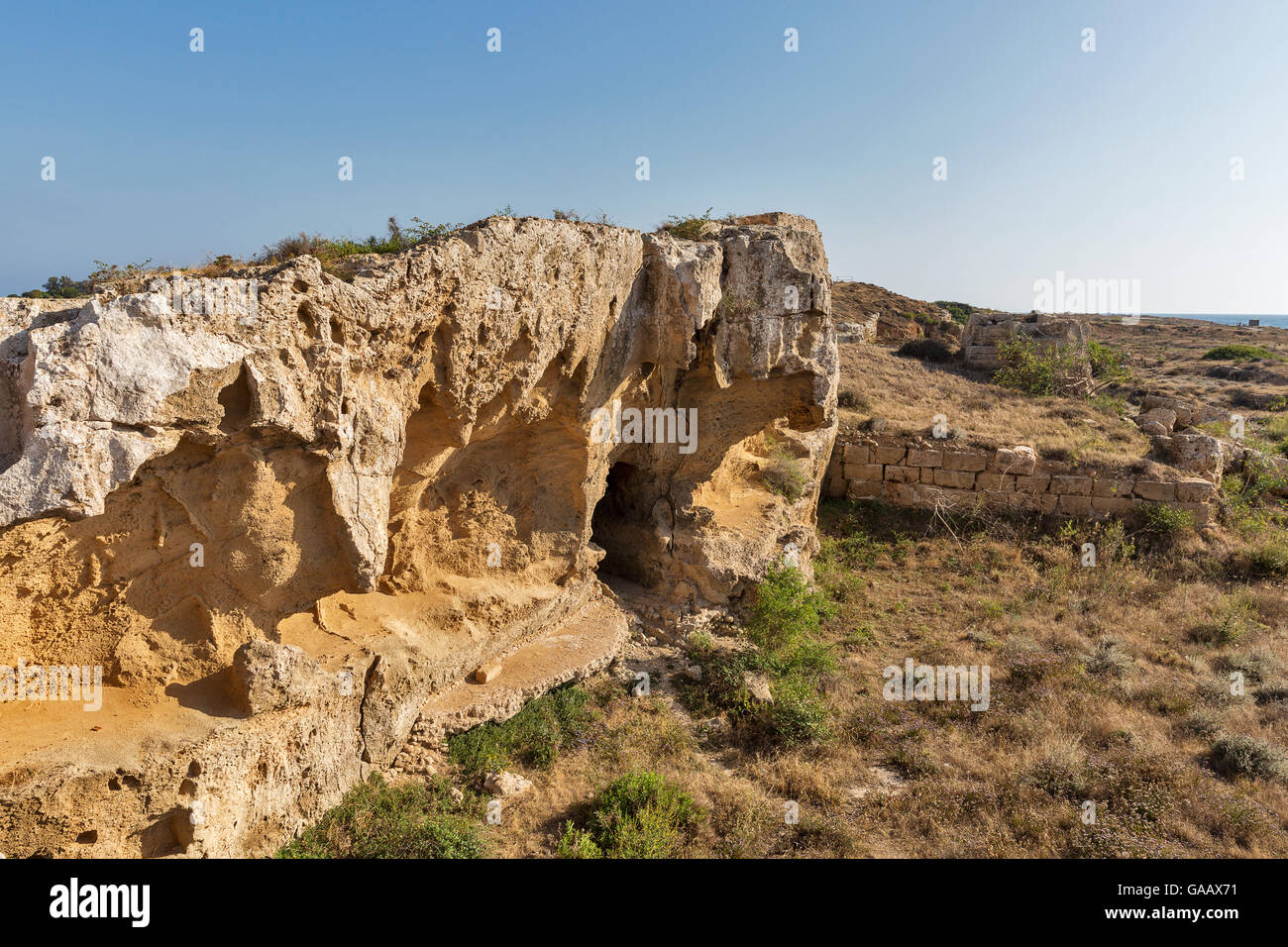 Ancient city walls ruins in Tombs of the Kings ancient necropolis of ...