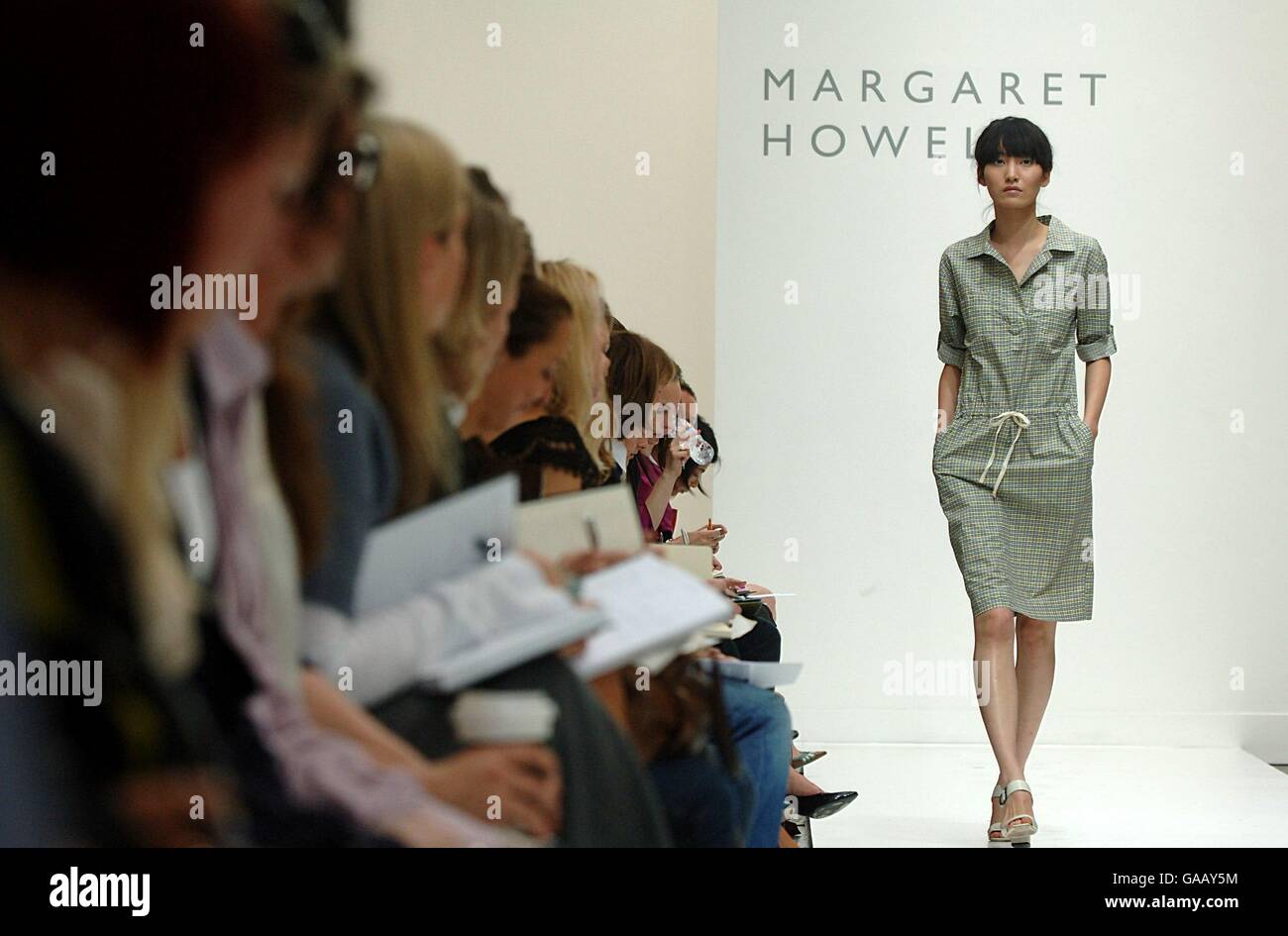 London Fashion Week - Margaret Howell Show. A model wears a creation by ...