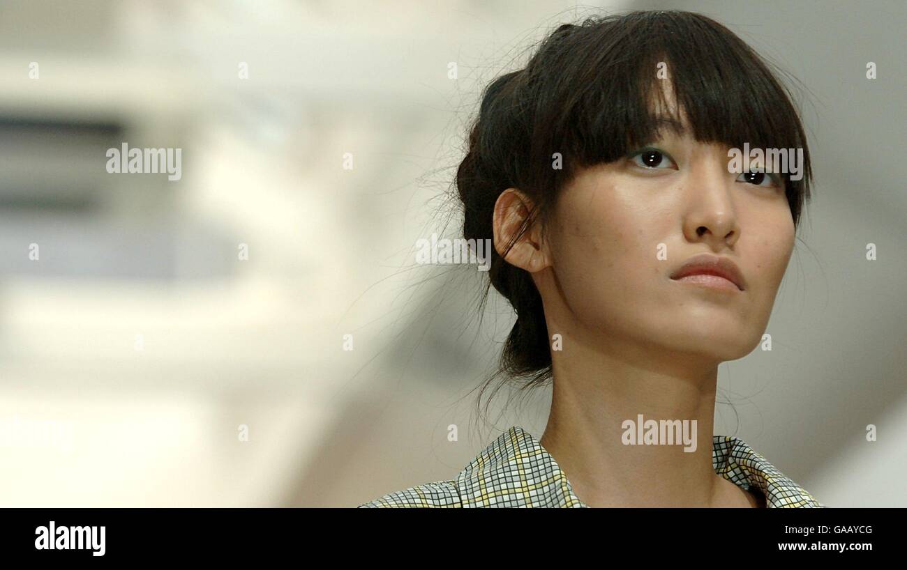 A model wears a creation by designer Margaret Howell at 34 Wigmore St ...