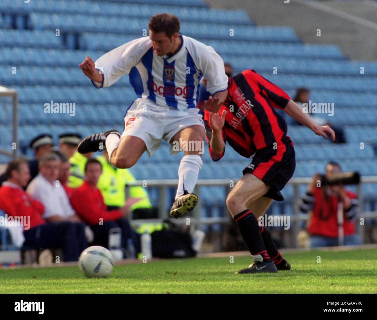 Tiptree United's Colin Wall and Whitley Bay's Jon Sunderland battle for ...