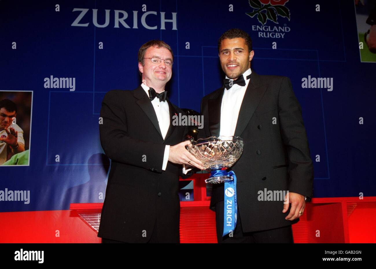 Wallace Dobbin (l) of Zurich awards Jason Robinson of Sale Sharks the ...