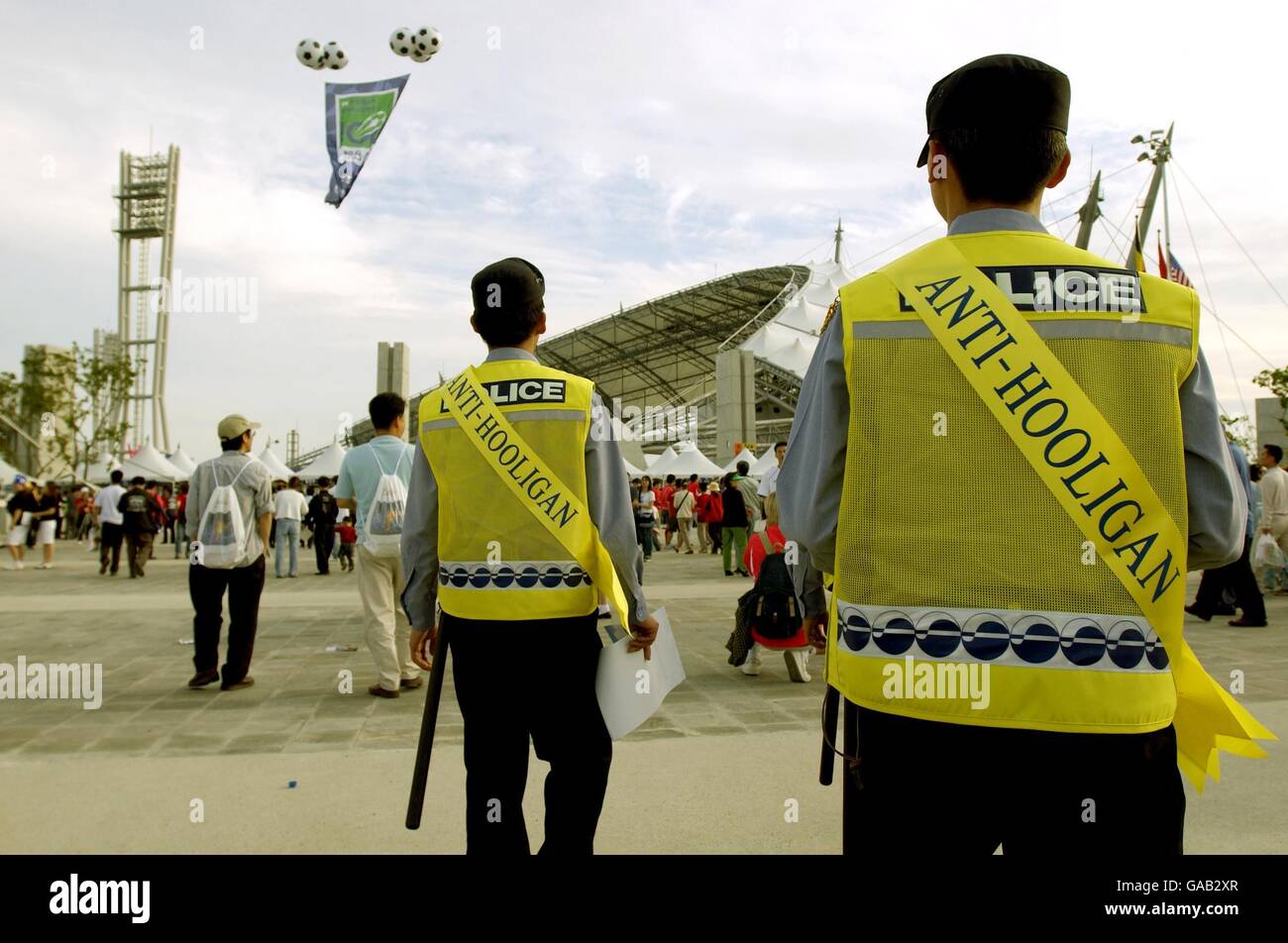 South Korean anti-hooligan police mix with fans before the game Stock ...