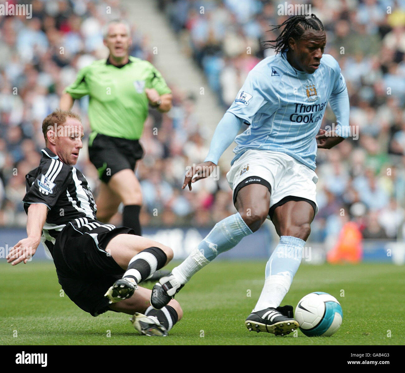 Newcastle United's Nicky Butt (left) challenges Manchester City's Emile ...