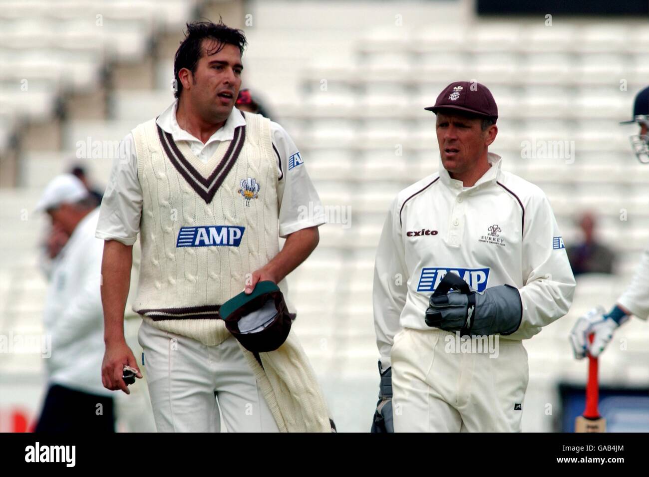 Surrey's Jimmy Ormond (l) and Alec Stewart (r) in discussion at the end ...