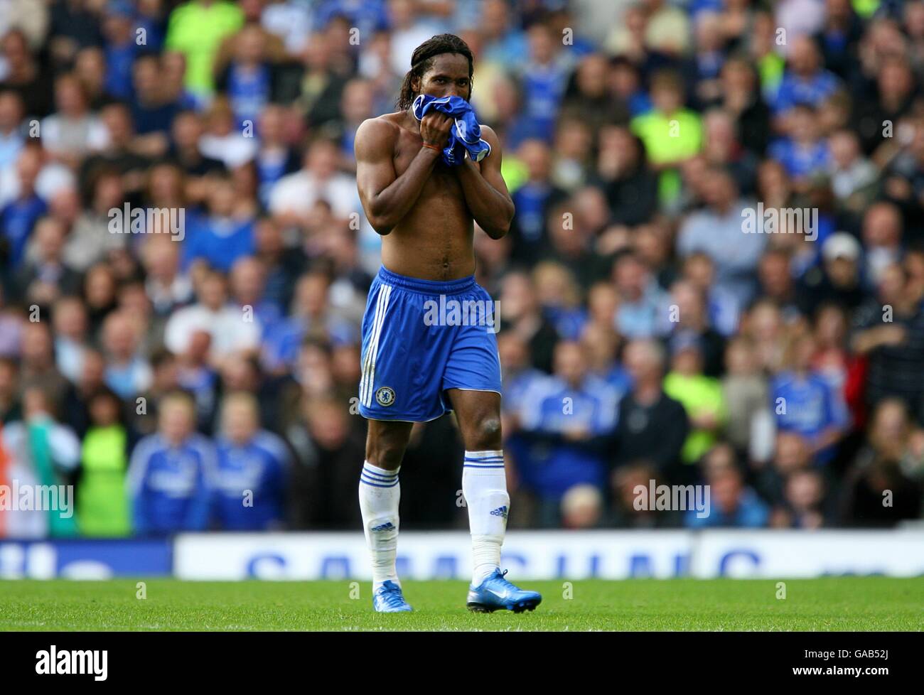 Chelsea's Didier Drogba is shows the red card by referee Martin ...