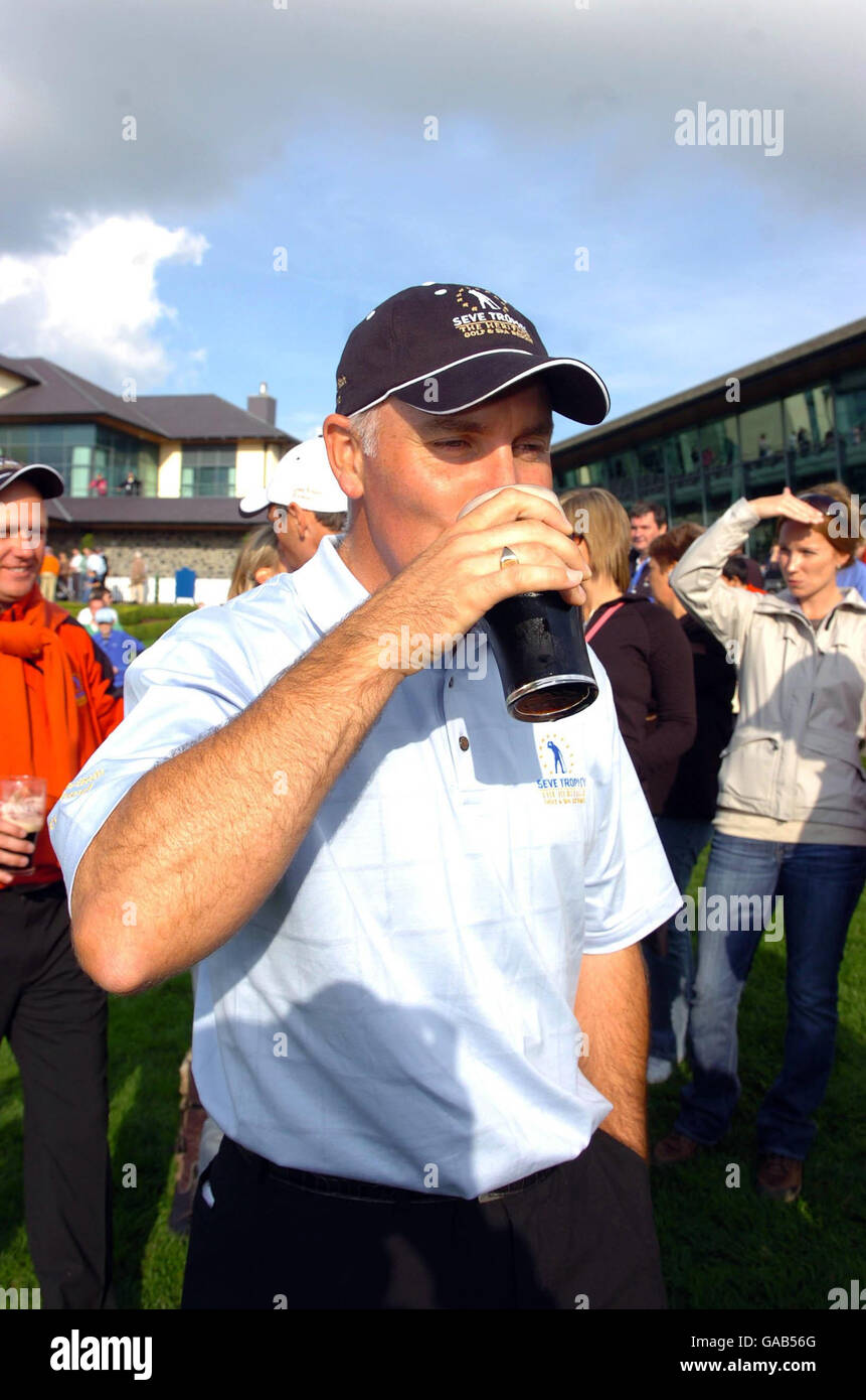 Great Britain and Ireland's Philip Archer celebrates with a pint of ...