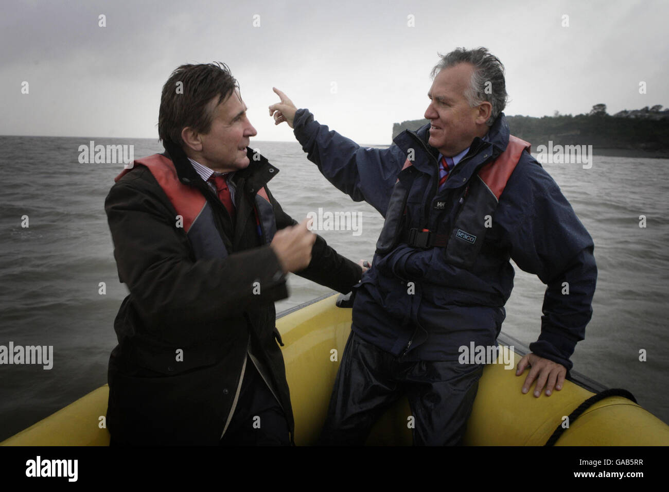 Welsh Secretary Peter Hain (right) talks with Professor Brian Morgan on ...
