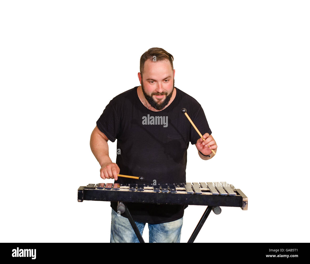 One man with a beard play on the percussion music instruments.isolated ...