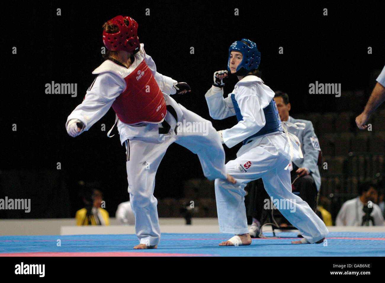 France's Maeve Musso (red) in action against Ukraine's Reznik Ganna ...