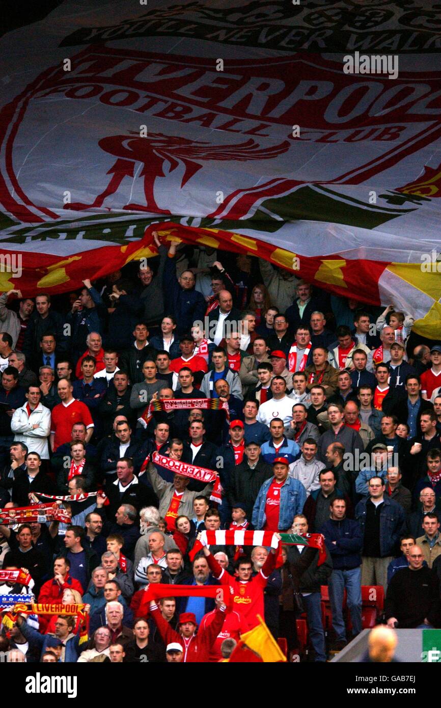 Liverpool fans pass huge club crest banner the crowd hi-res stock ...