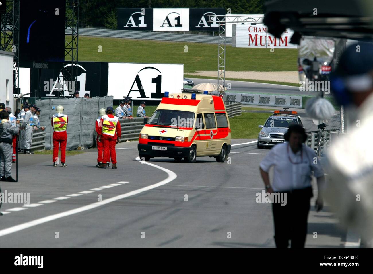 Formula One Motor Racing - Austrian Grand Prix - Race. An ambulance ...