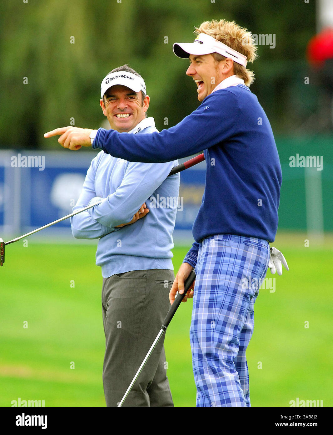 Ireland's Paul McGinley (left) and England's Ian Poulter (right) share ...