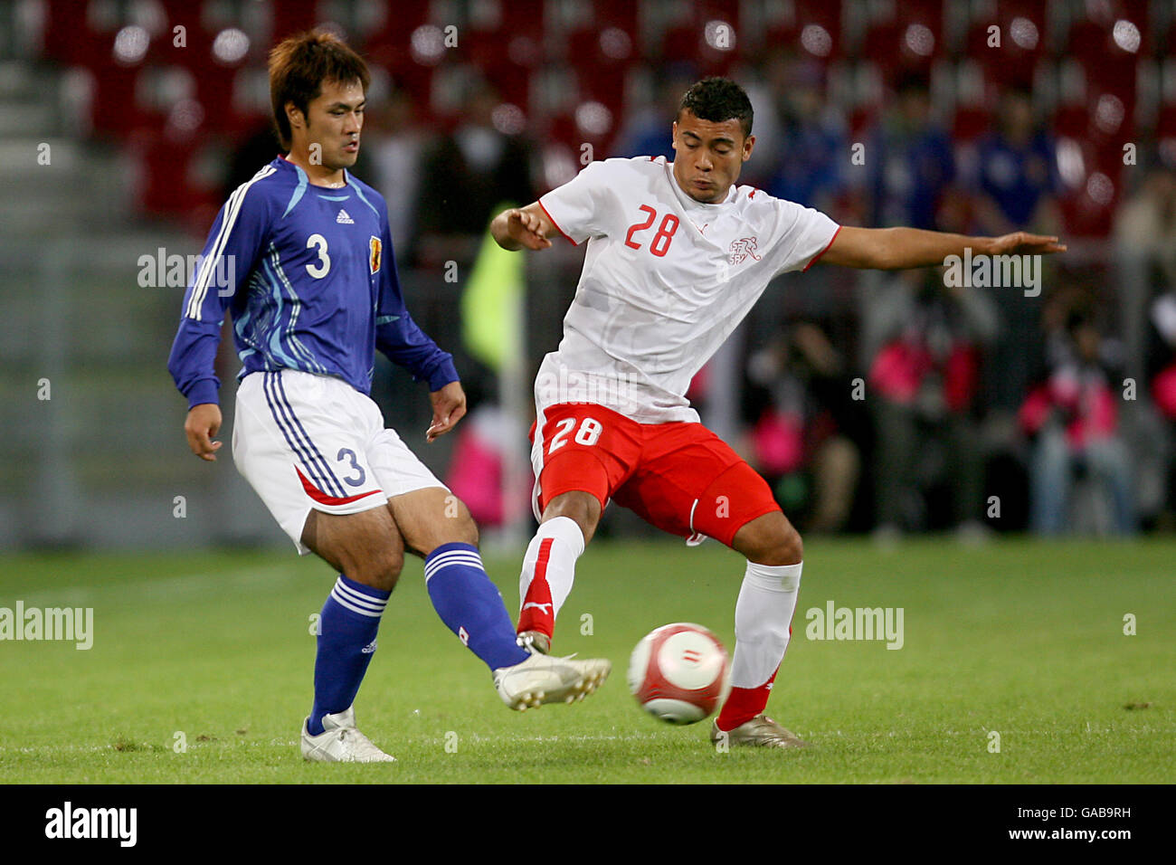 Yuichi switzerlands johan vonlanthen battle for the ball hi-res stock ...