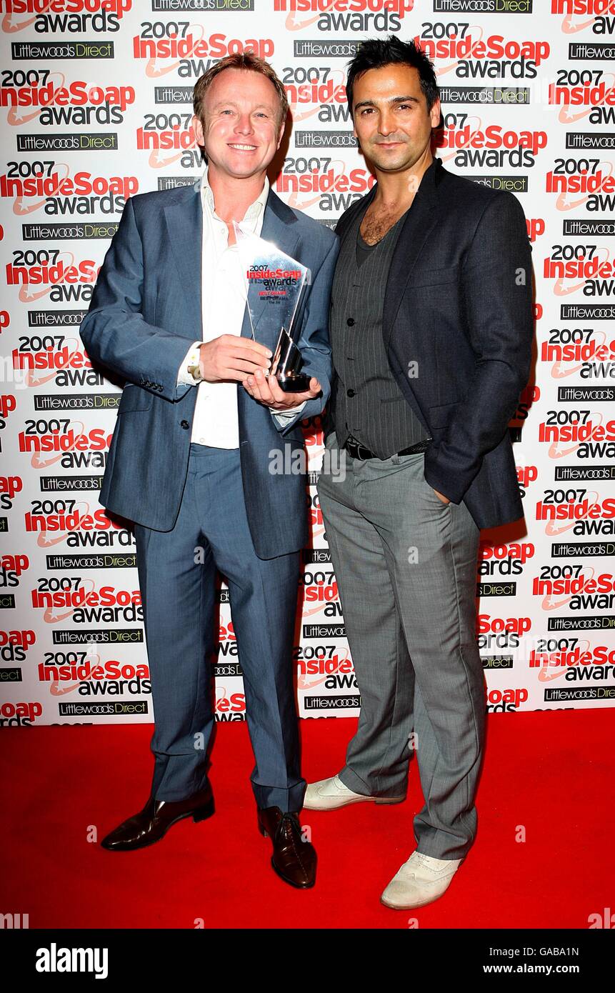 Chris Simmons (left) and Doug Rao with the award for Best Drama at the ...