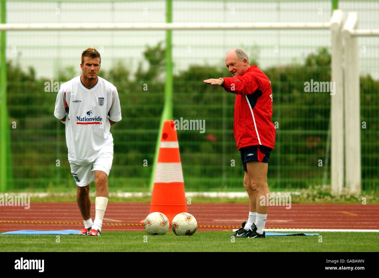 David Beckham of England trains during his rehabilitation trying to ...