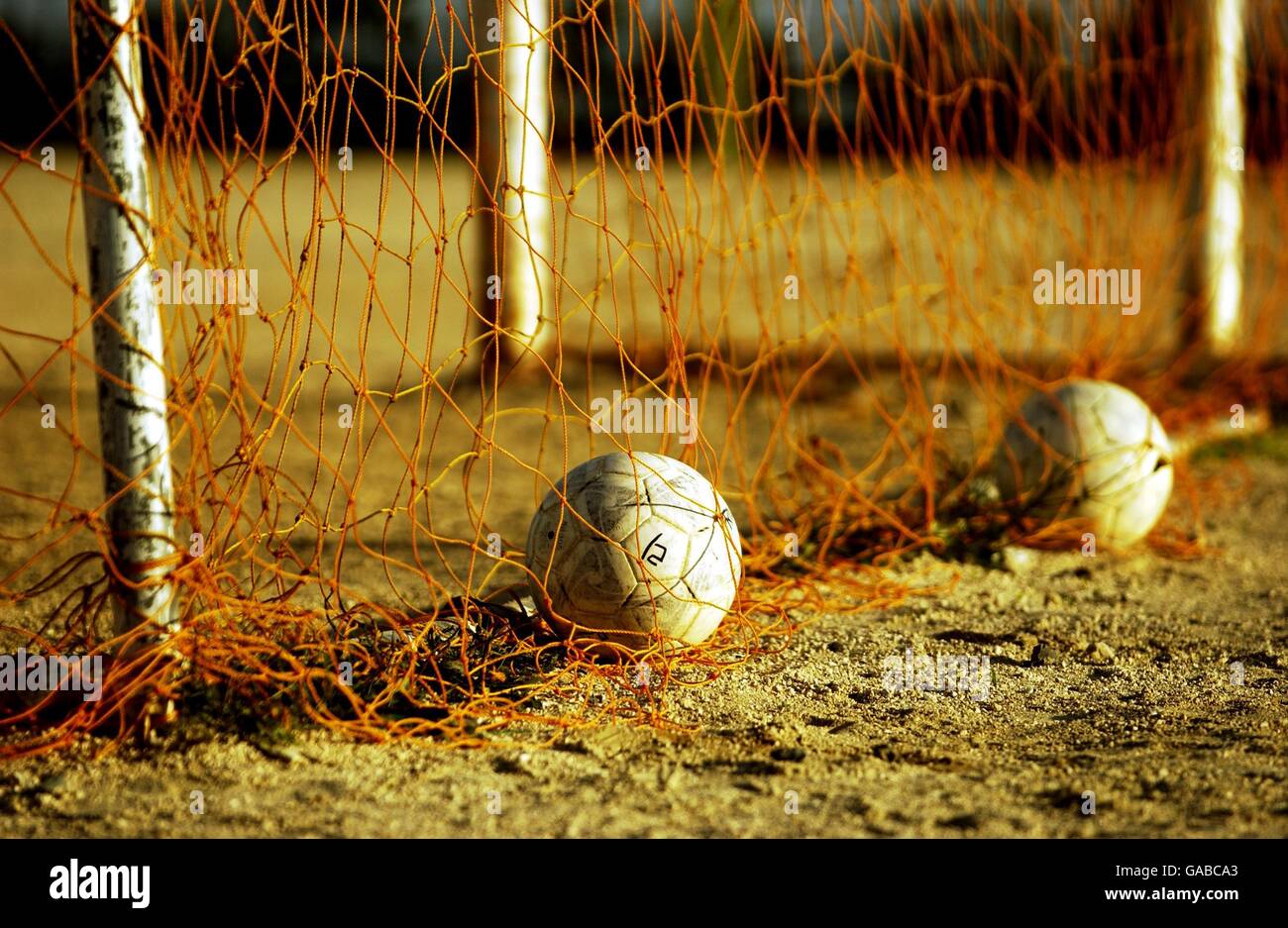Footballs in net hi-res stock photography and images - Alamy