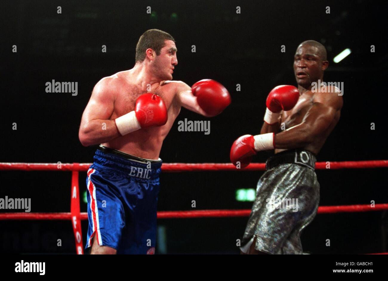 Eric teymour l catches toks owoh with a left hook hi-res stock ...