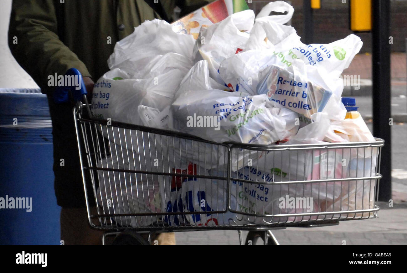 Generic picture of tesco carrier bags in a shopping trolley hi-res ...