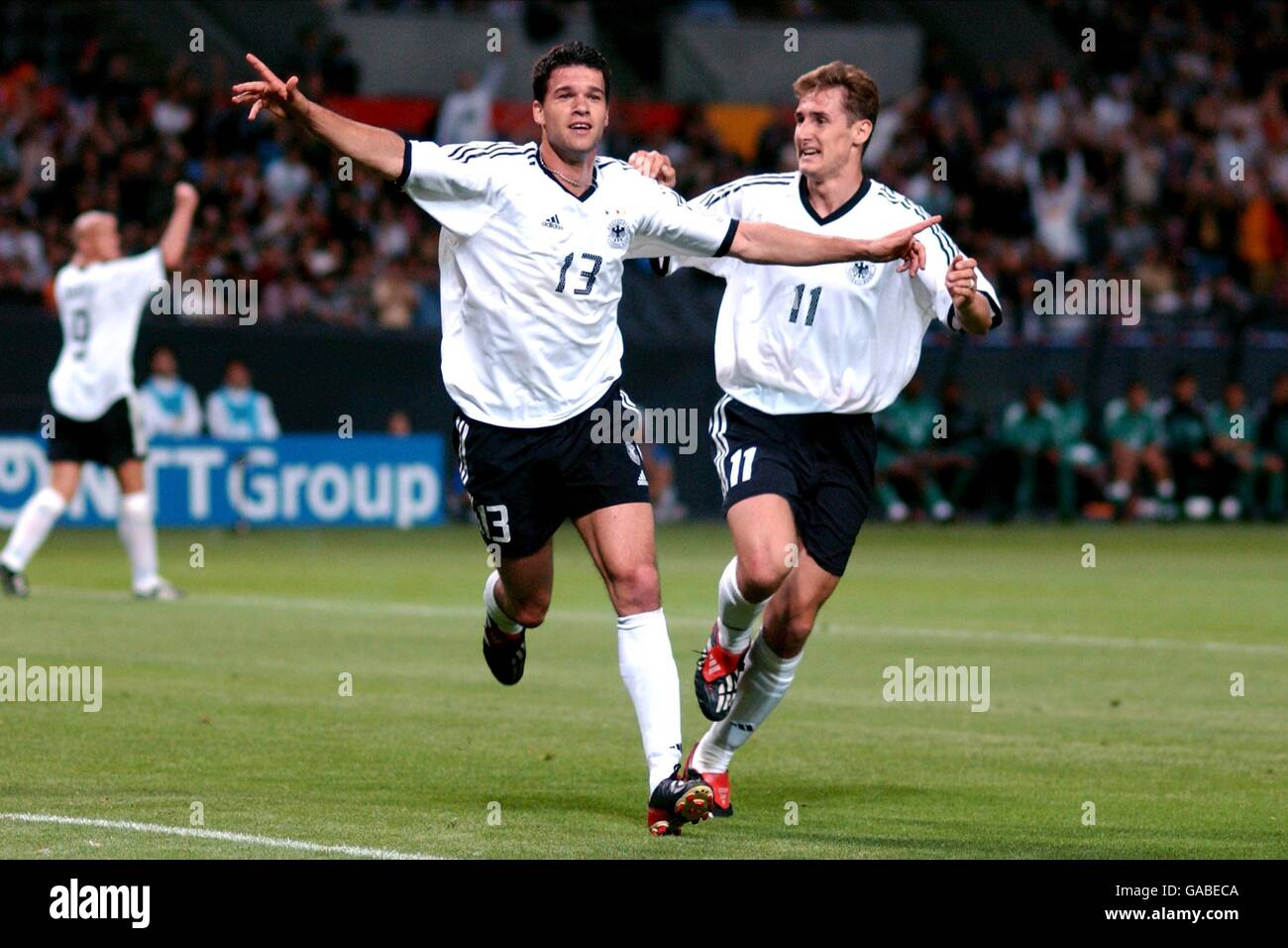 l-r; Germany's Michael Ballack celebrates scoring their third goal with ...