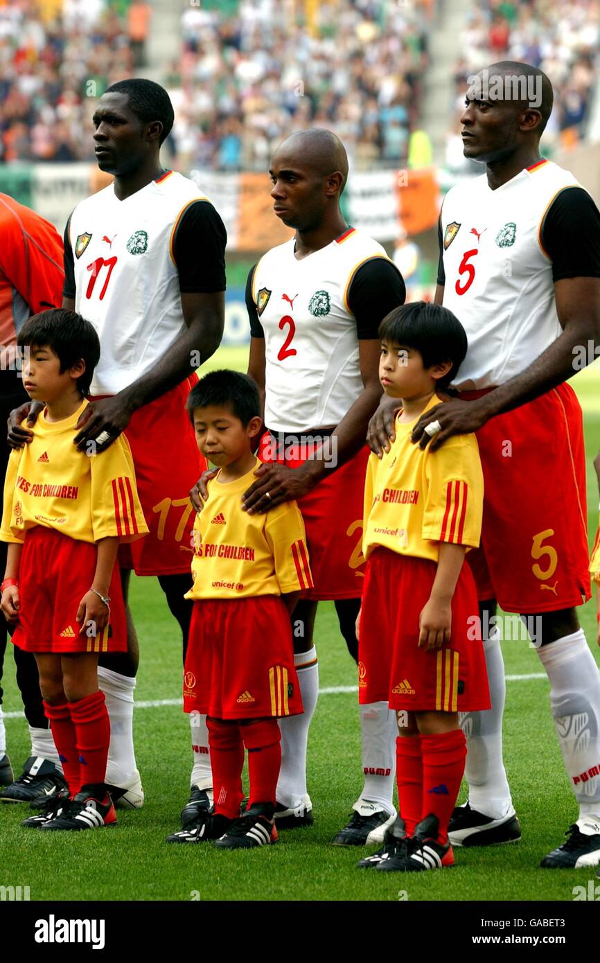 L-R: Cameroon's Marc-Vivien Foe, Bill Tchato and Raymond Kalla line up ...