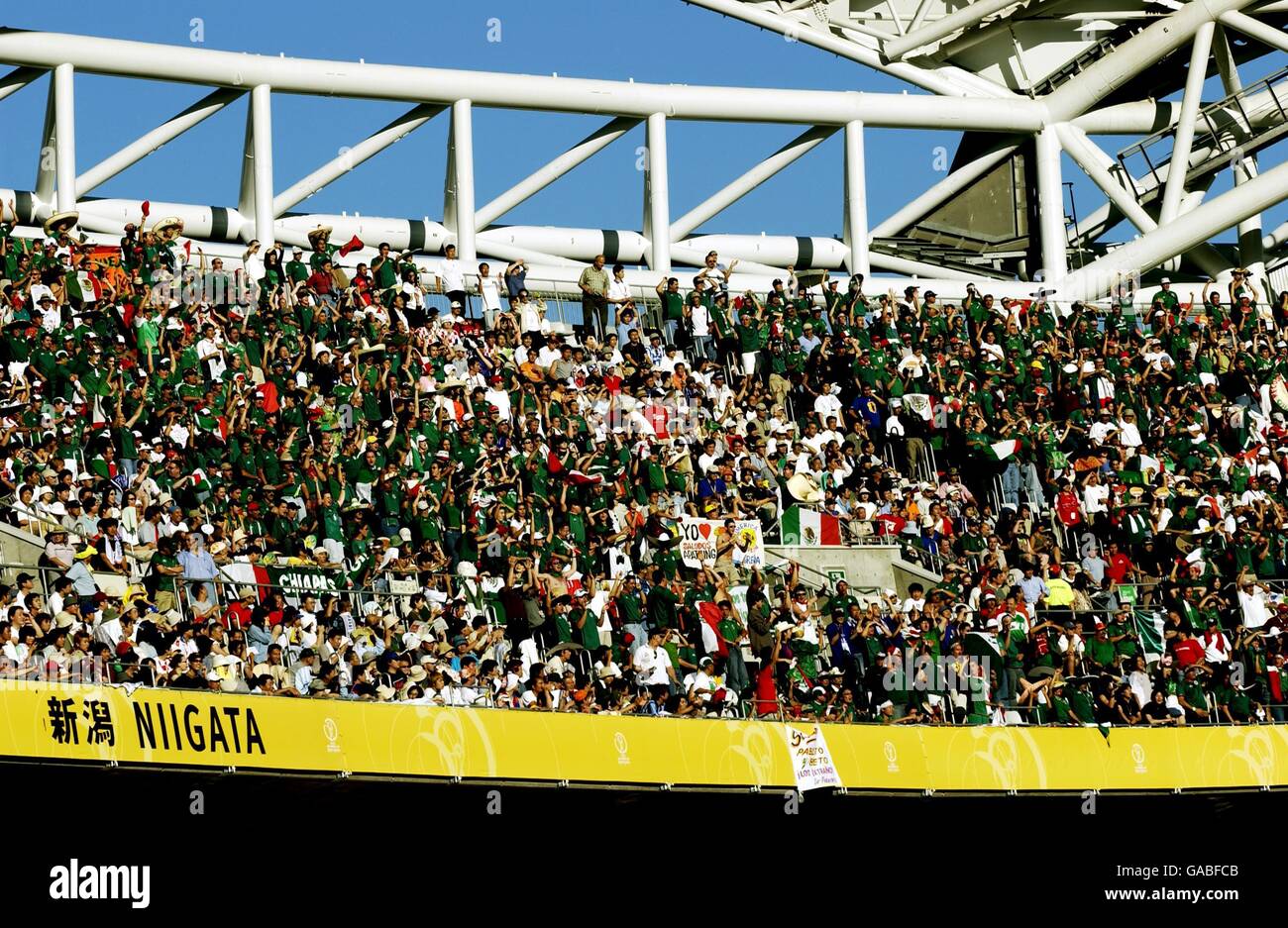 Mexico fans celebrate their 1-0 victory over Croatia in the Big Swan ...