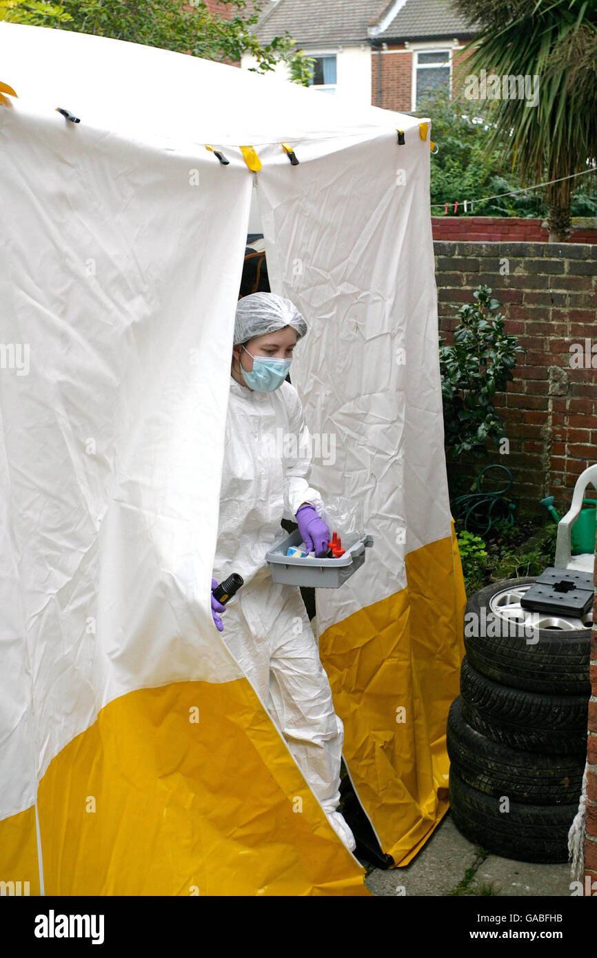 Police search house in missing girl hunt Stock Photo - Alamy