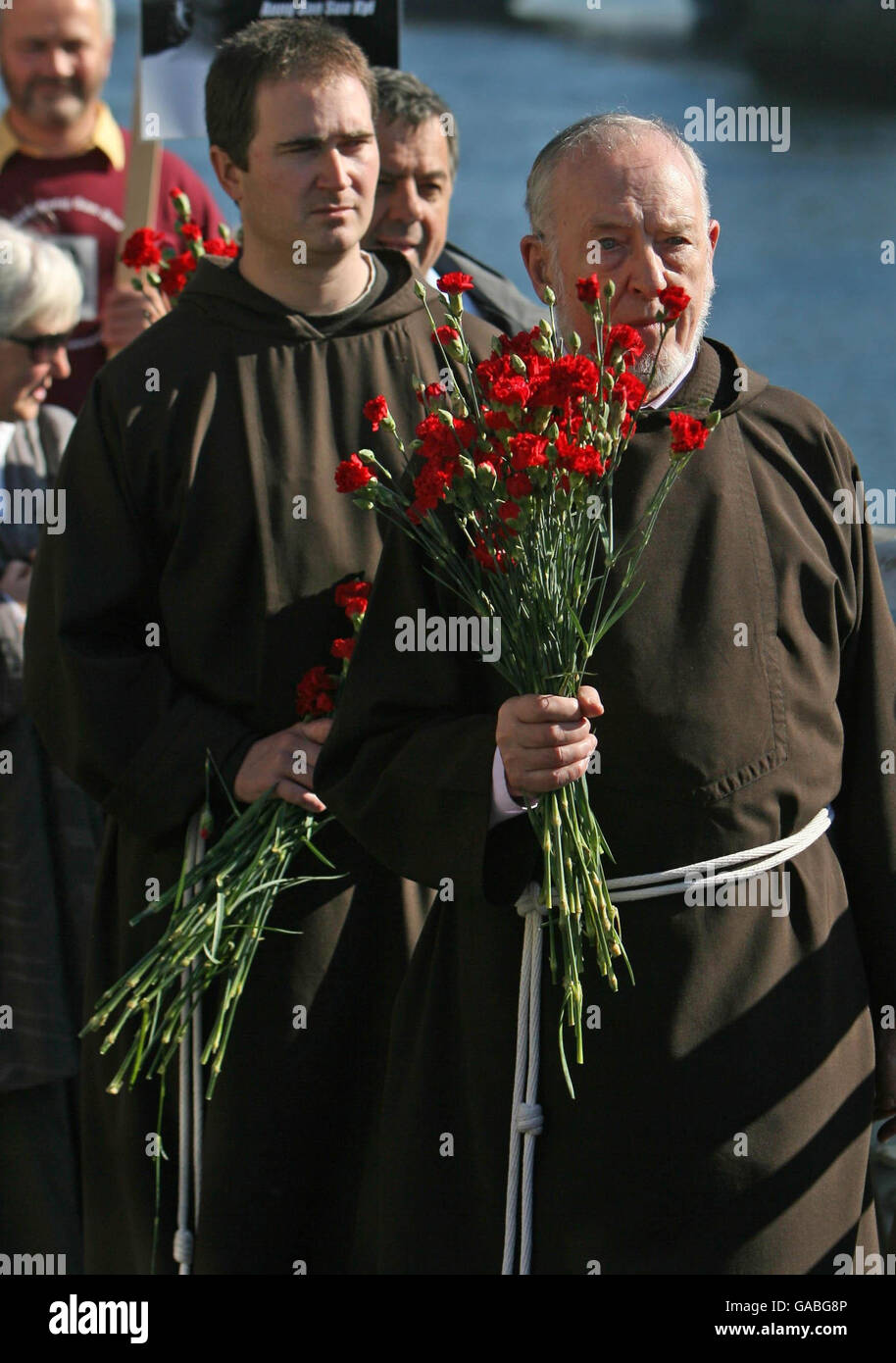 Irish monks from the Capuchin and Carmelite orders are joined by ...