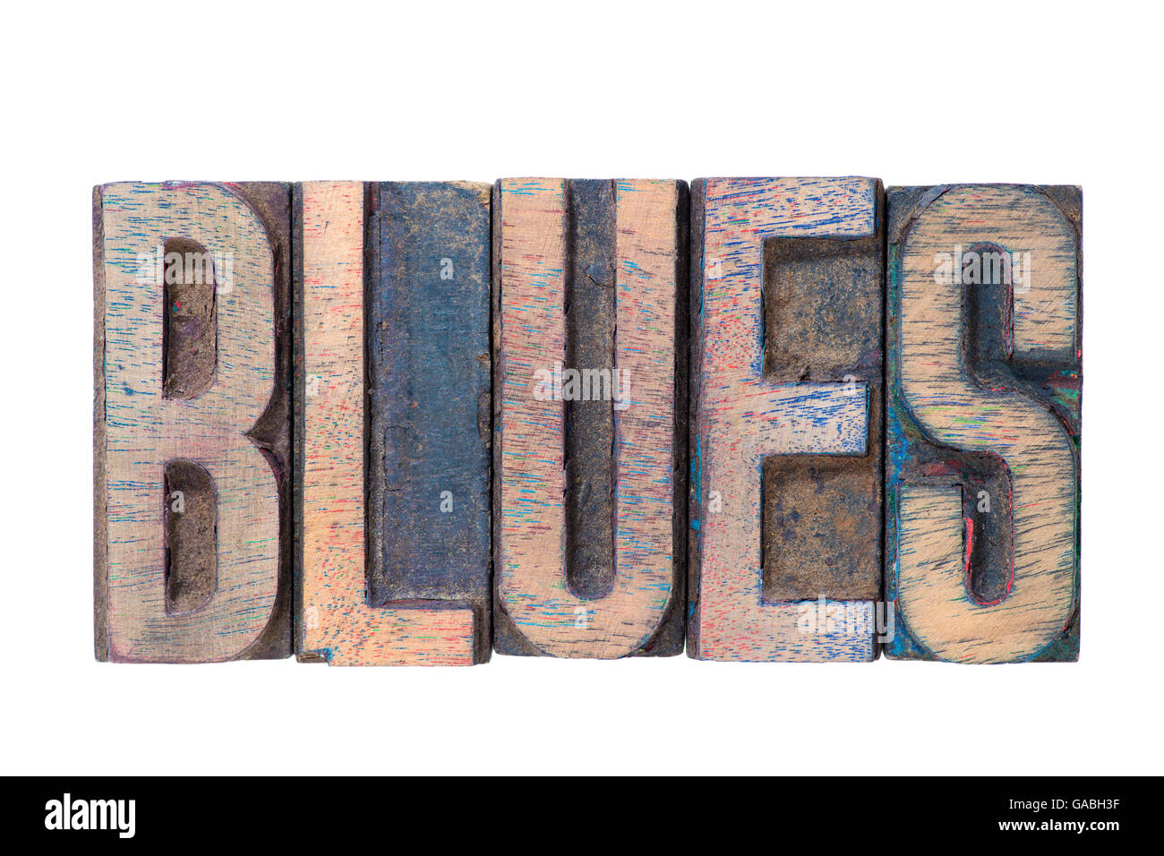 blues word made from mixed wooden letterpress type isolated on white ...