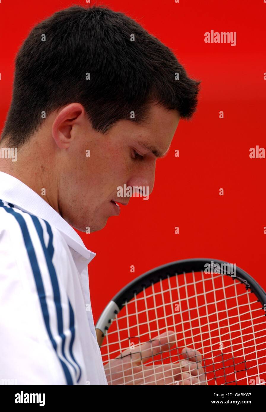 Tennis - Stella Artois Championships.. Englands Tim Henman adjusts his ...