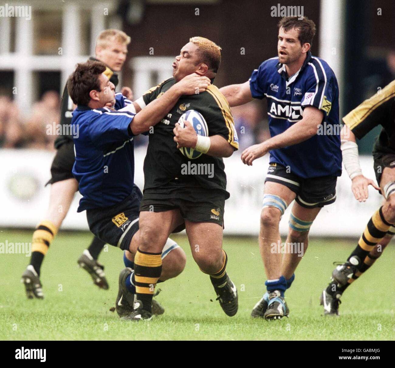 Sales' Mark Giacheri and Scott Lines tackle Wasps' Trevor Leota Stock ...