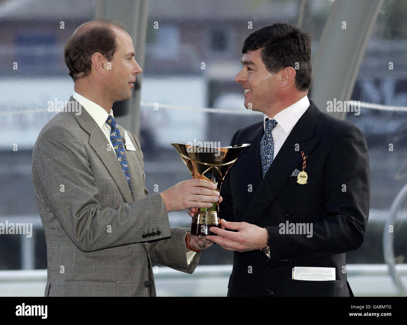HRH The Earl of Wessex presents the winning owner trophy to Simon ...