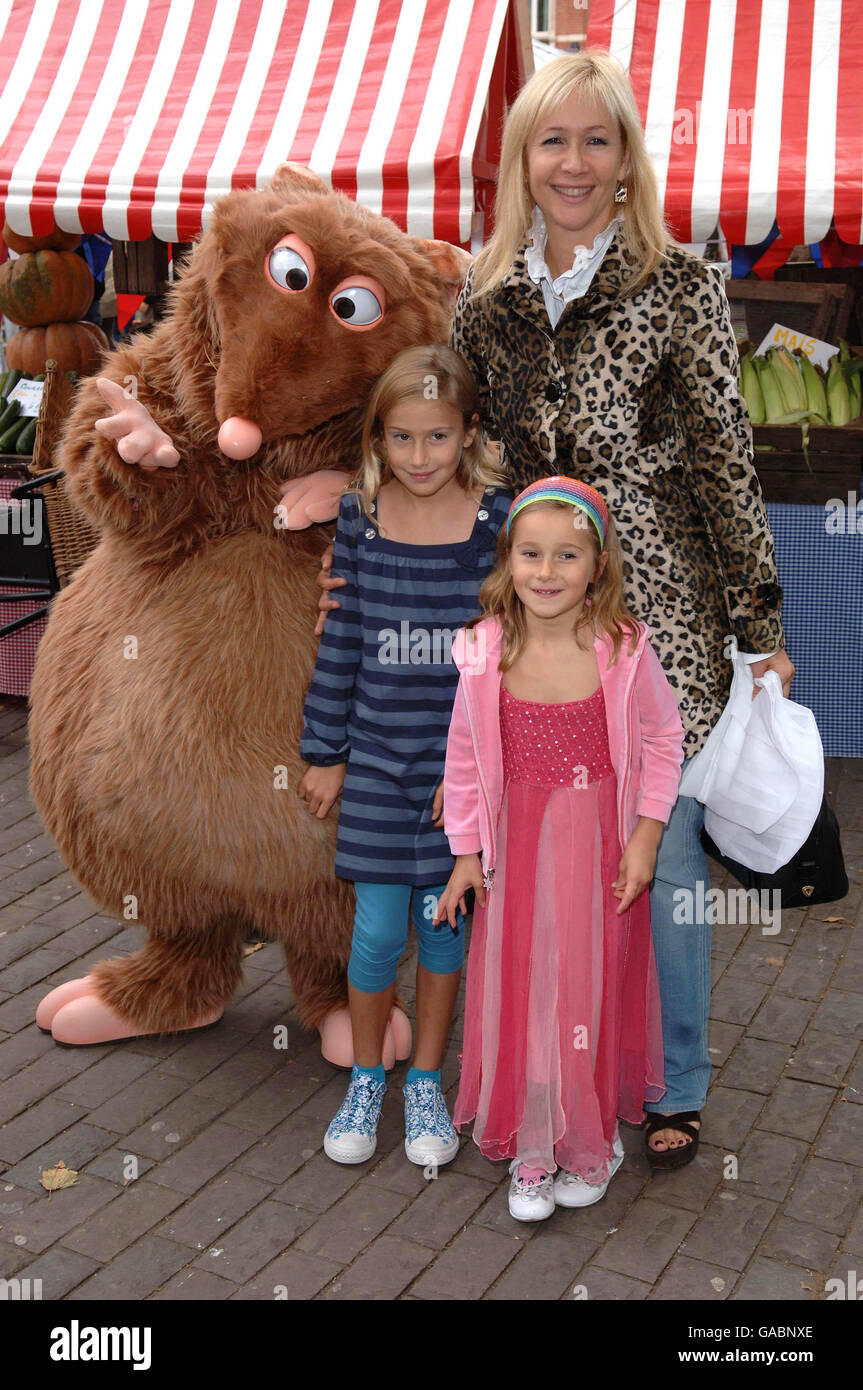Tania Bryer and her children arrive at the French Market, in the middle ...