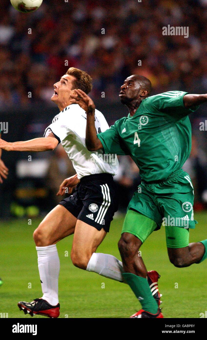 Germany's Miroslav Klose (l) and Saudi Arabia's Abdullah Sulaiman ...