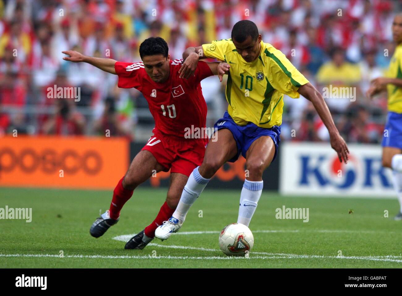 Brazils rivaldo holds off turkeys yildiray basturk hi-res stock ...
