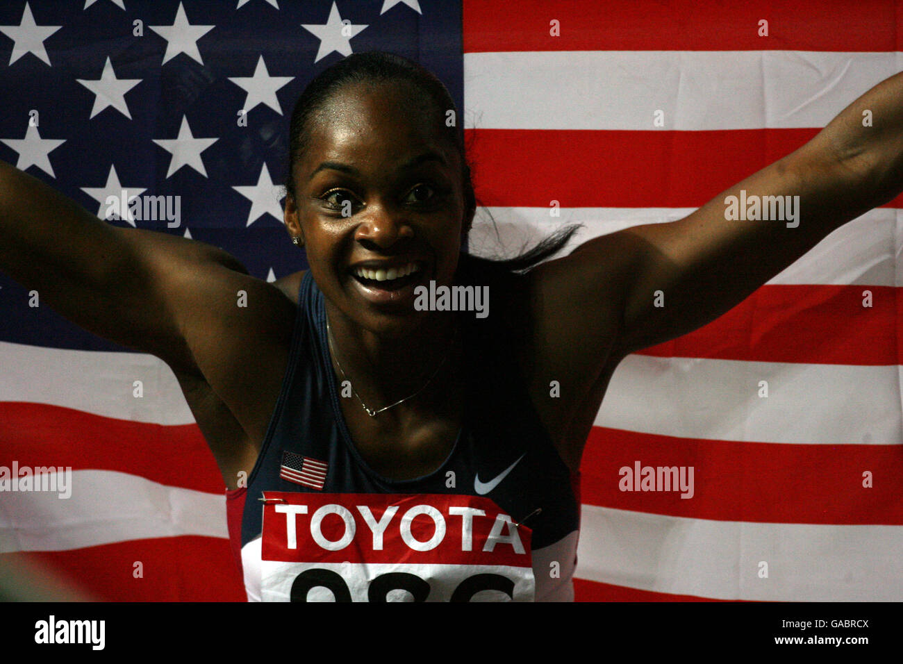 USA's Michelle Perry celebrates winning the 100 metre hurdles Stock ...