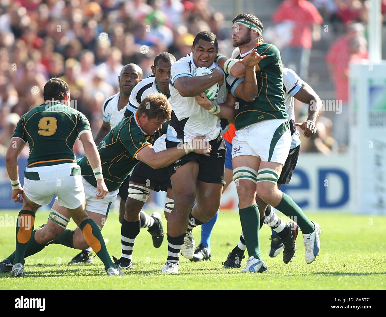 Fiji's Seremaia Bai cant find a way through the South Africa defence ...