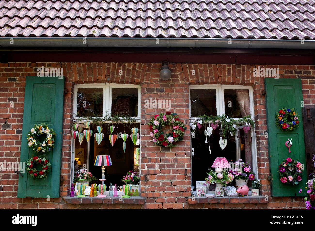 A gift shops windows and their roof Stock Photo - Alamy