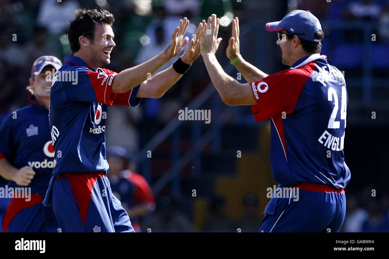 Half length mid top high five celebrating celebrate smiling england ...