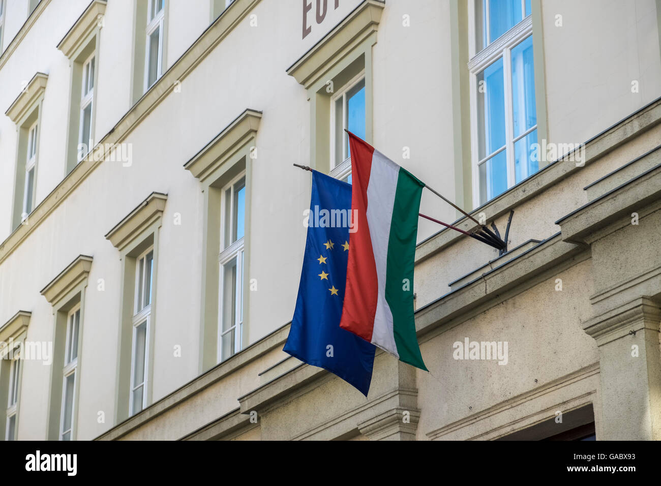 Hungarian and European flags attached to government building, Budapest, Hungary Stock Photo - Alamy