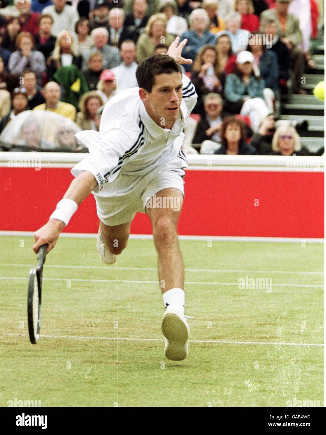 Tim henman stretches ball hi-res stock photography and images - Alamy