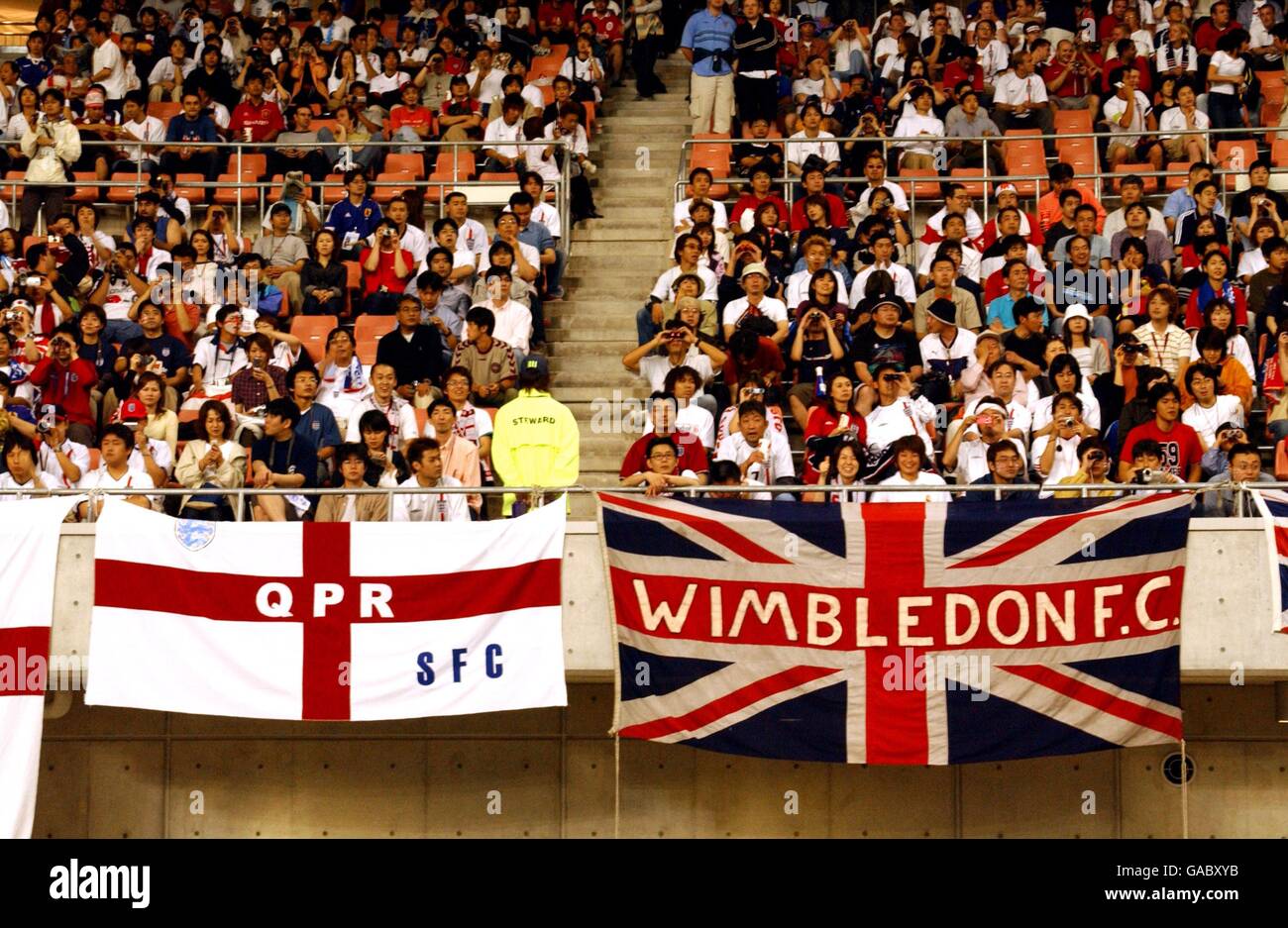 Queens Park Rangers and Wimbledon flags sit side by side at the Big ...