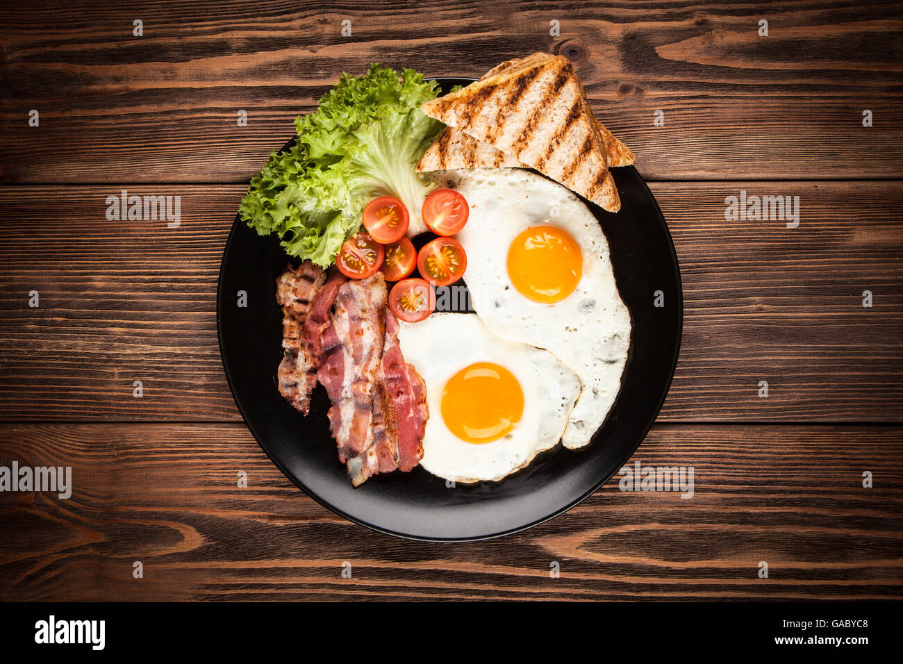 Traditional breakfast on a plate Stock Photo - Alamy