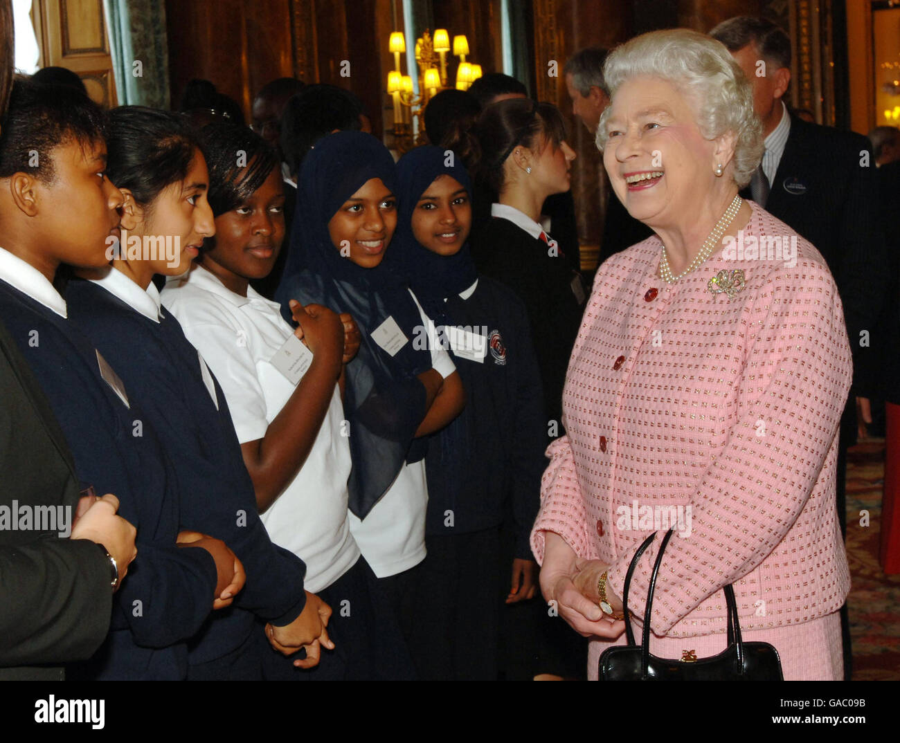 Queen Elizabeth II meets with girls from Cumberland School in Newham ...