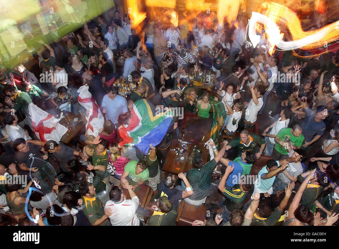 South Africa fans celebrate in the Walkabout Bar, London, after South ...