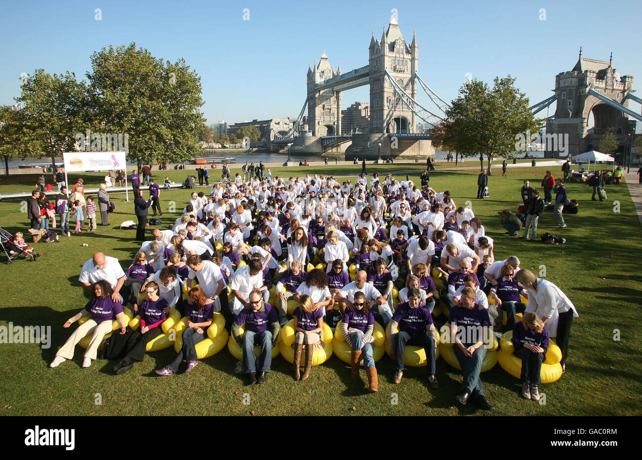 154 people in inflatable chairs are massaged in world's largest group ...